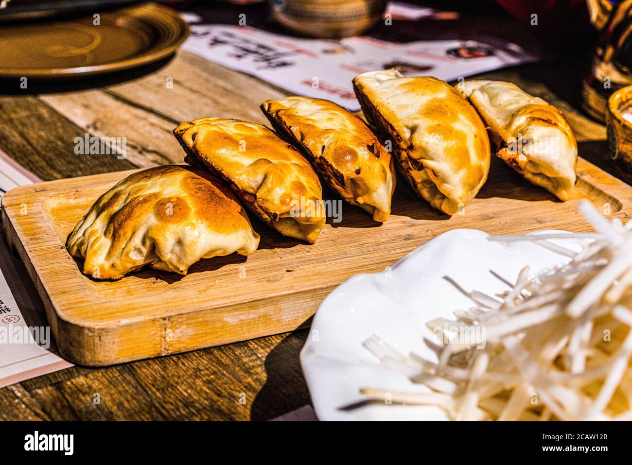 Roast buns filled with beef and soup, also known as kaobaozi, a ...