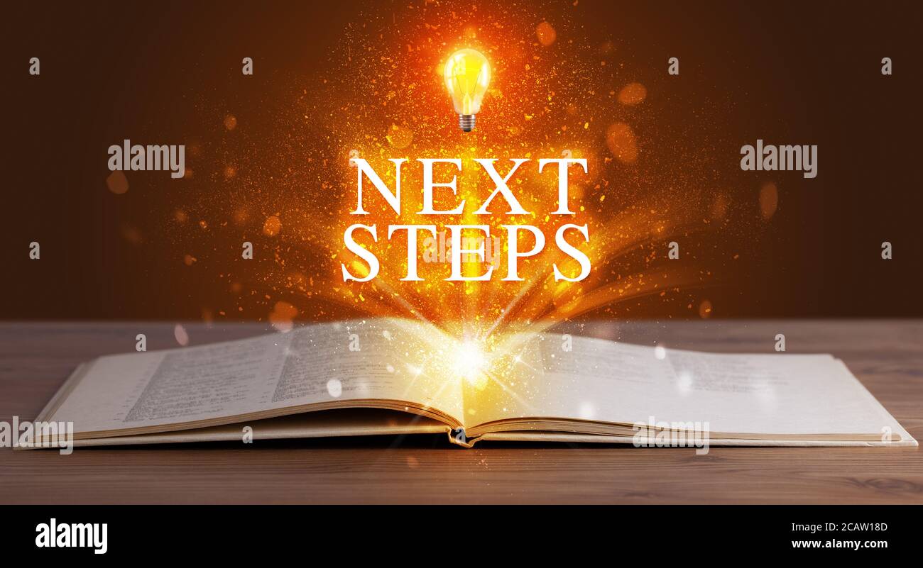 NEXT STEPS inscription coming out from an open book, educational ...