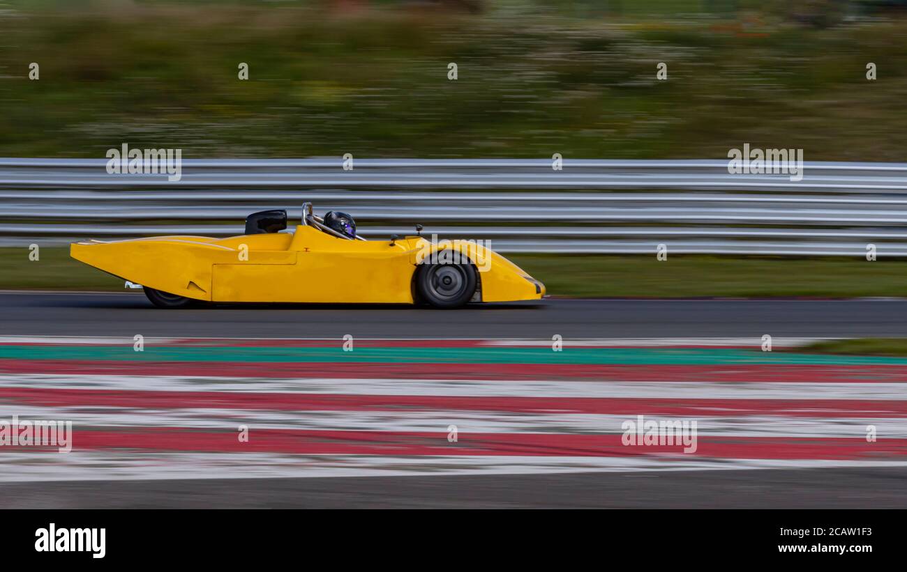Yellow racing car hi-res stock photography and images - Alamy