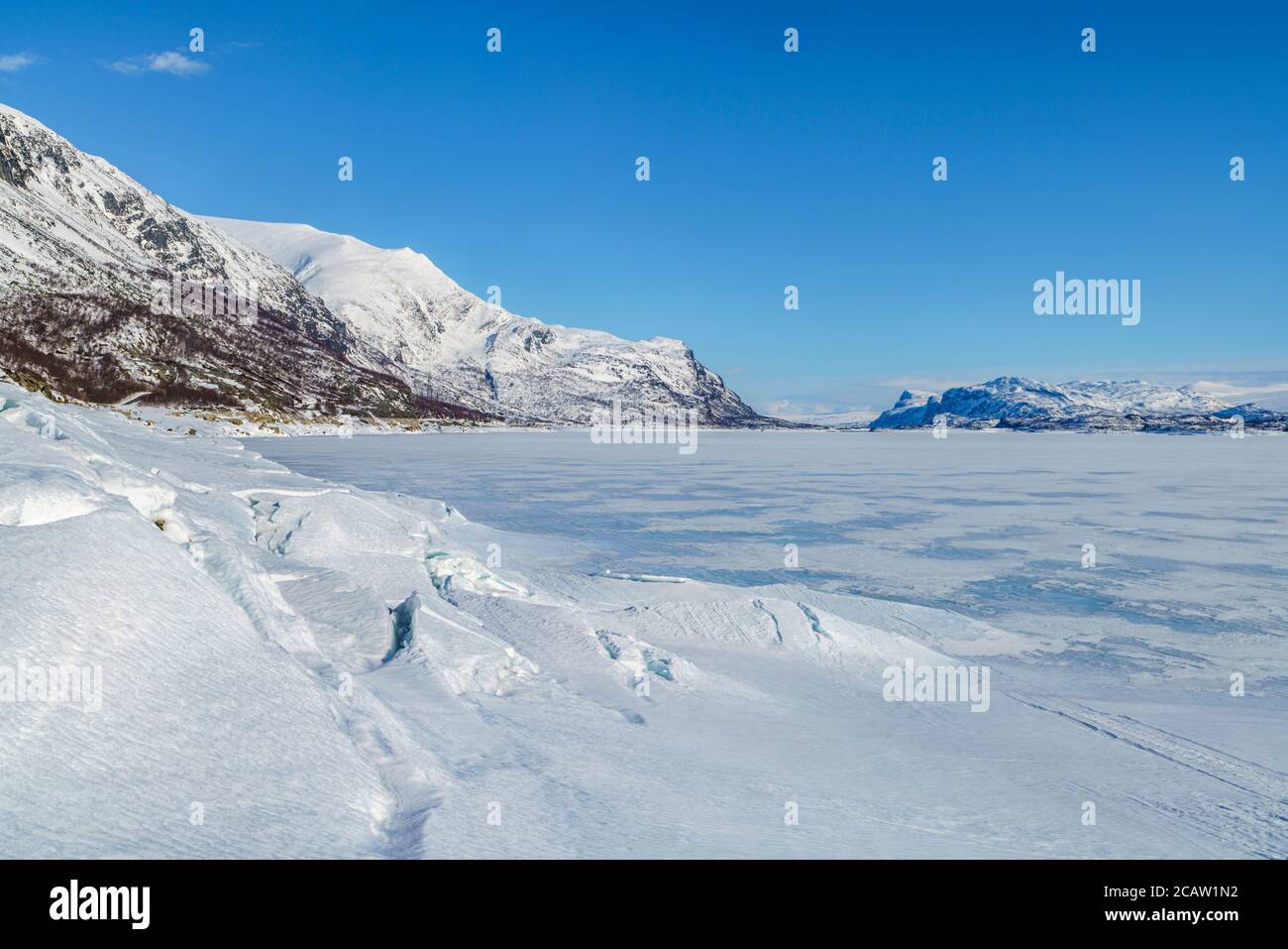 Snowy landscape in spring time with mountains in background, Stora ...