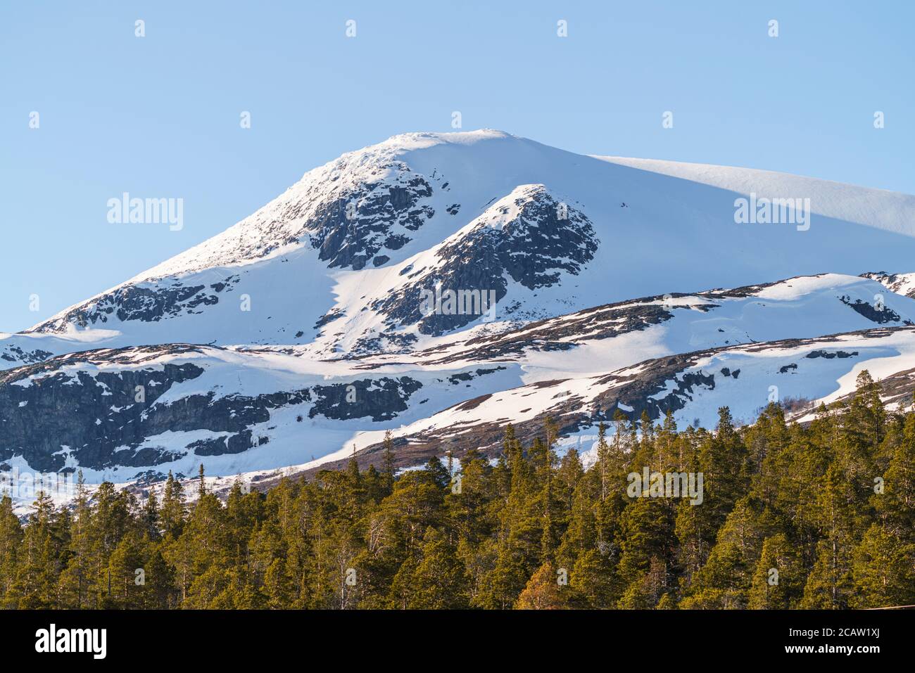 Snowy landscape in spring time with mountains in background, Stora ...