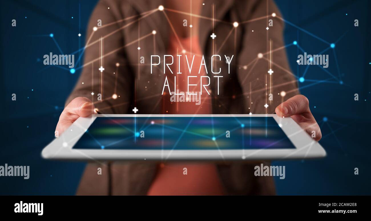 Young business person working on tablet and shows the digital sign ...