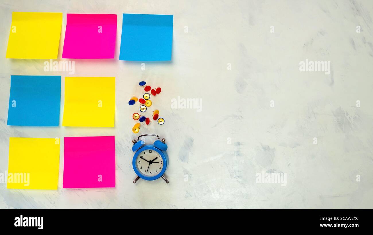 Several blank colorful post-it notes with copy space for text on light ...