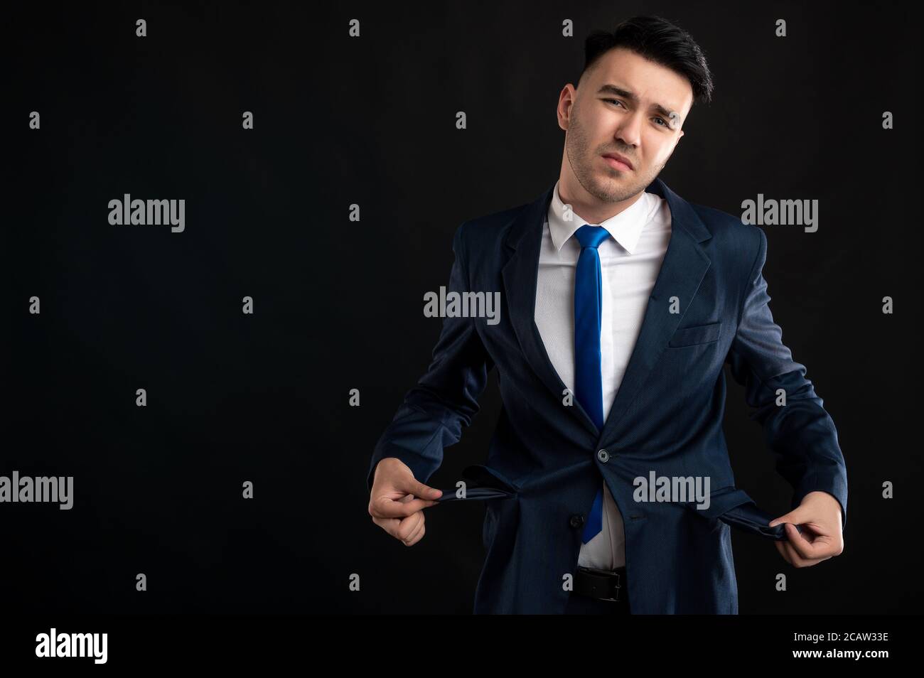 Portrait of business man wearing blue business suit and tie empty ...