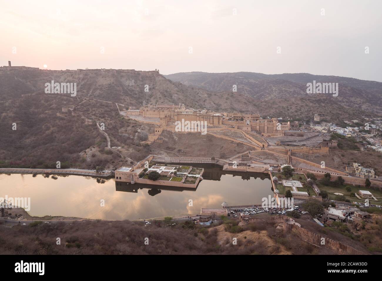 Scenic landscape of Amber Fort and lake during sunset, Jaipur, India ...