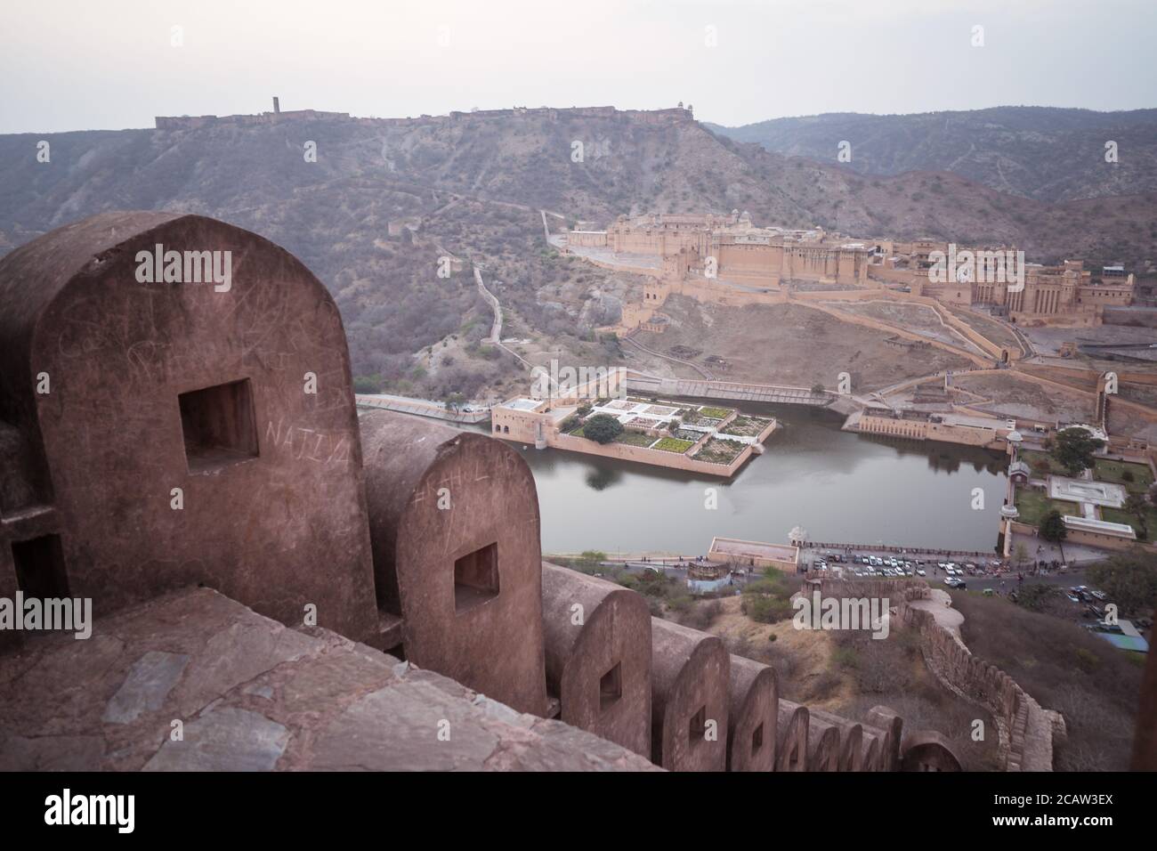 Scenic landscape of Amber Fort and lake during sunset, Jaipur, India ...
