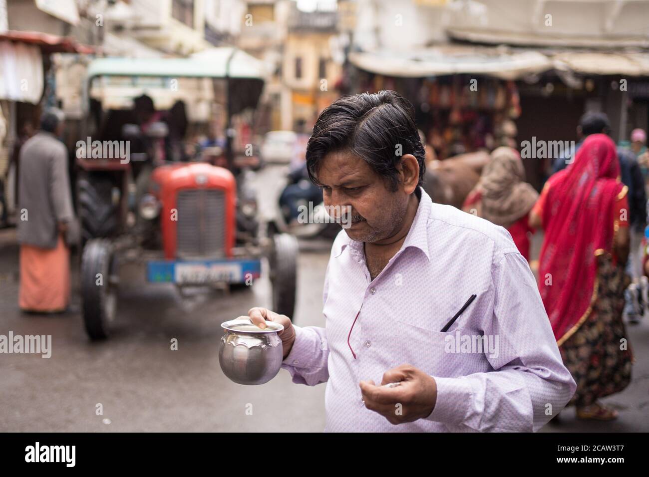 Indian man walking hi-res stock photography and images - Alamy
