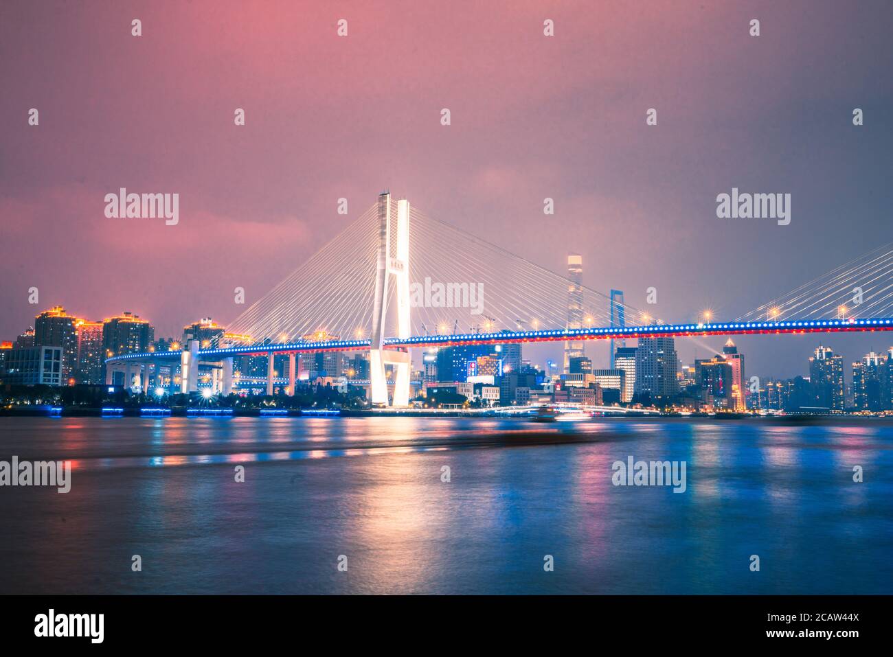 Night view of Nanpu Bridge, on Huangpu River, in Shanghai, China Stock ...