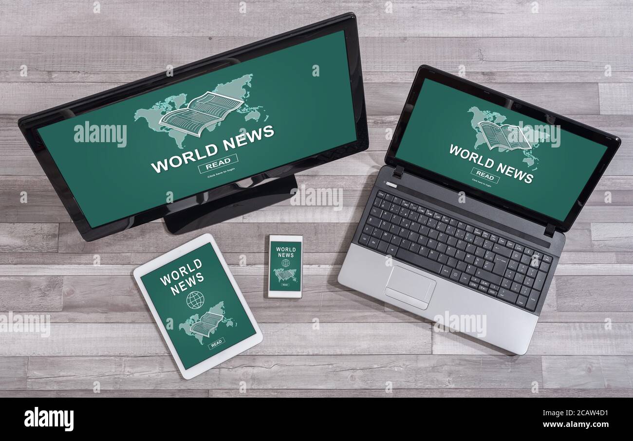 World news concept shown on different information technology devices ...