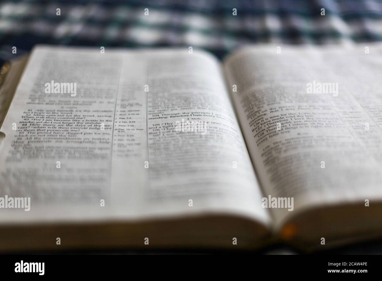 Closeup shot with linear tilt shift of the open Holy Bible Stock Photo ...