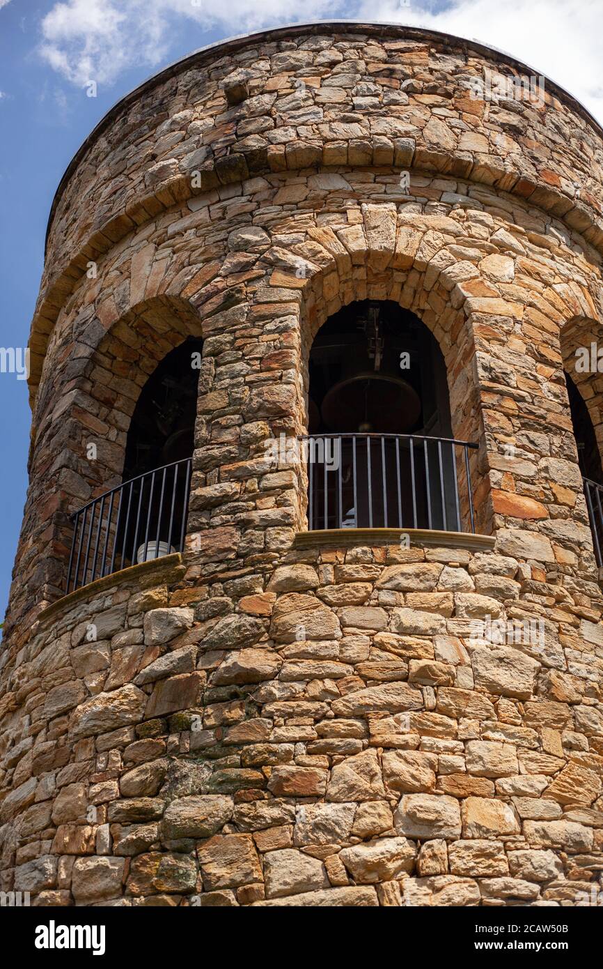 Low angle vertical shot of the stone Chimes tower in the Longwood ...