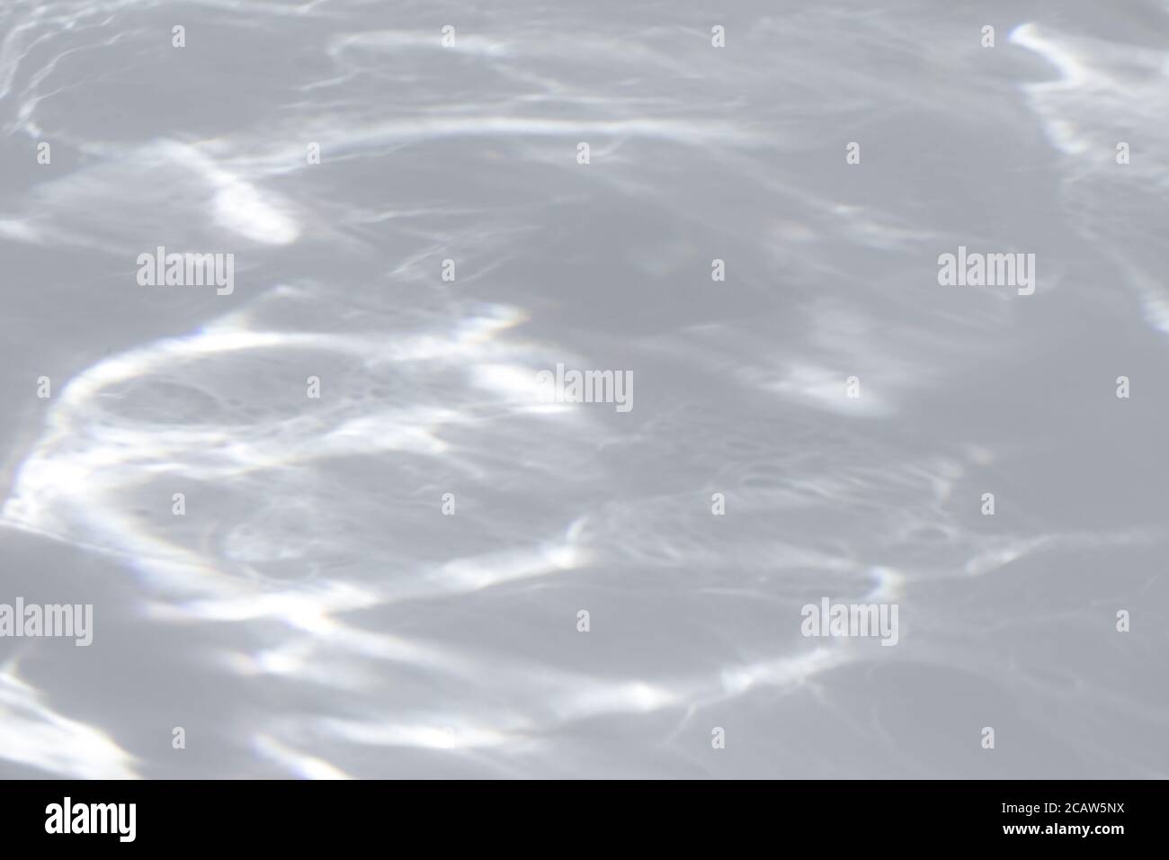 shadow and light caustic effect on a white wall Stock Photo - Alamy