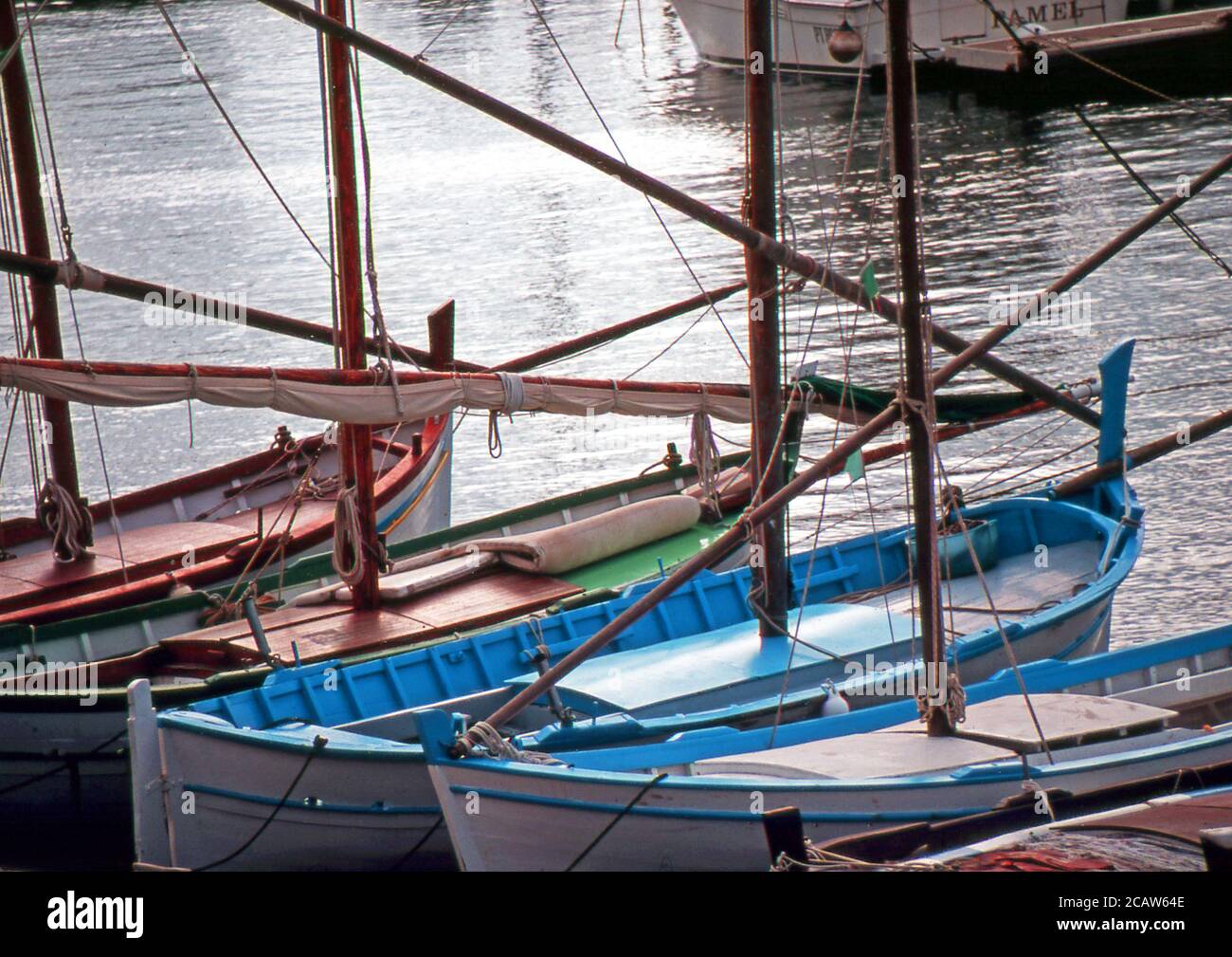 Stintino, Sardinia, Italy. Latin sail boat in harbour (scanned from ...