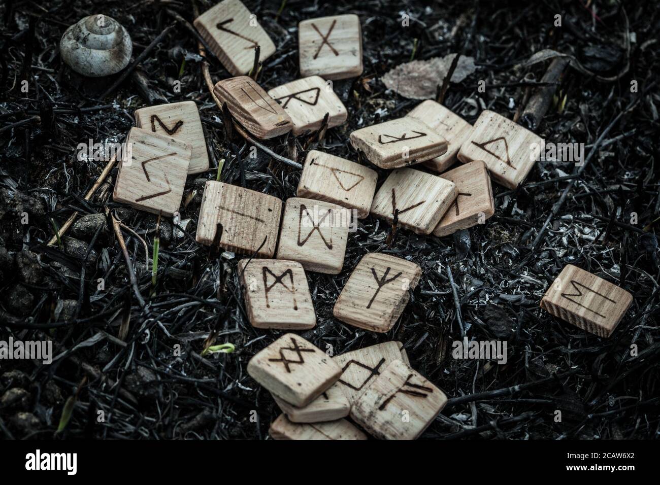 wooden runes on the ground Stock Photo - Alamy