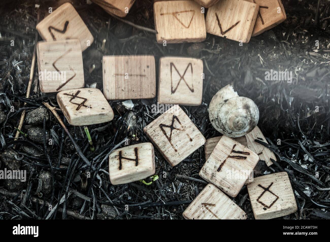 wooden runes on the ground Stock Photo - Alamy