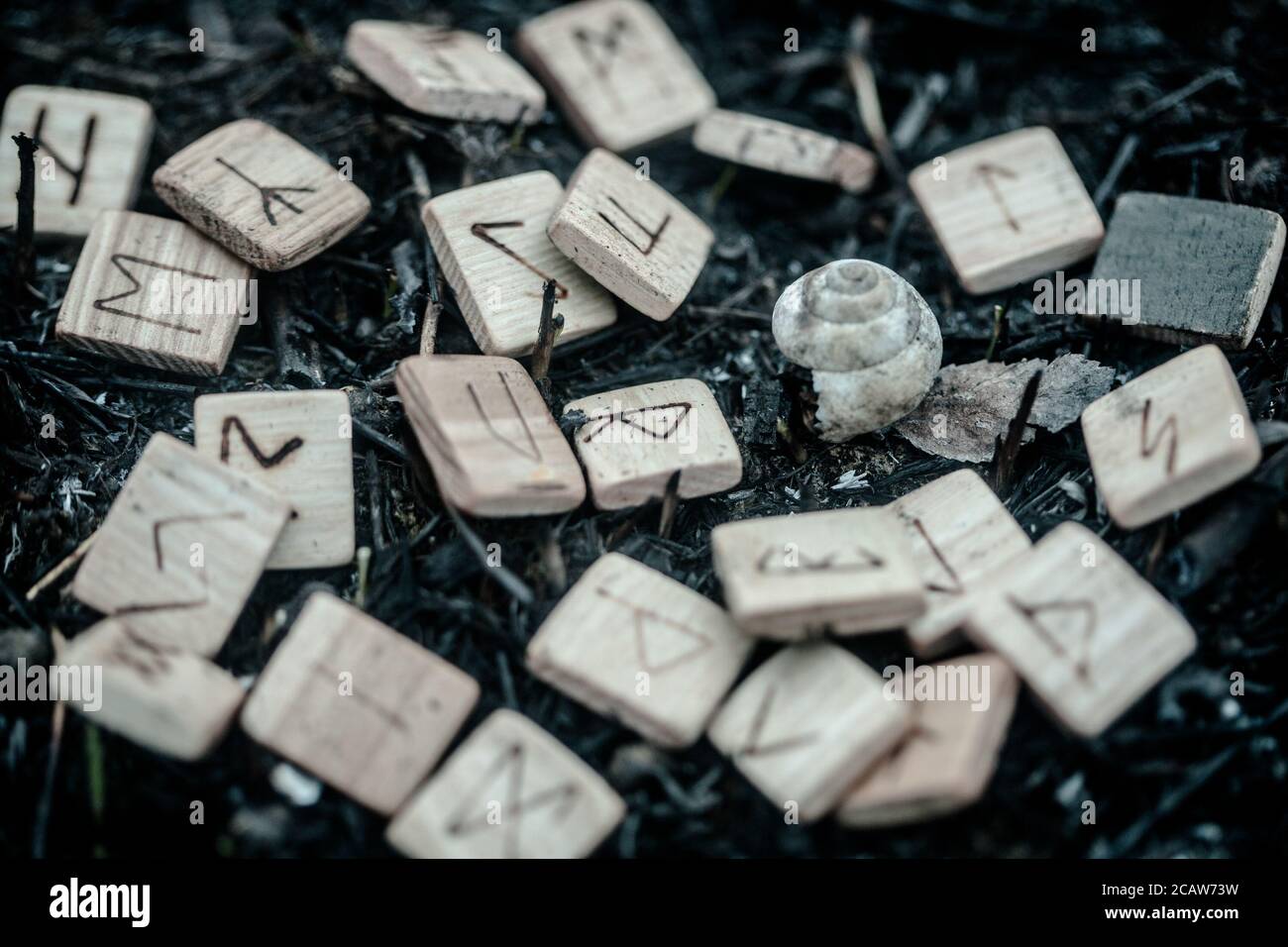 wooden runes on the ground Stock Photo - Alamy