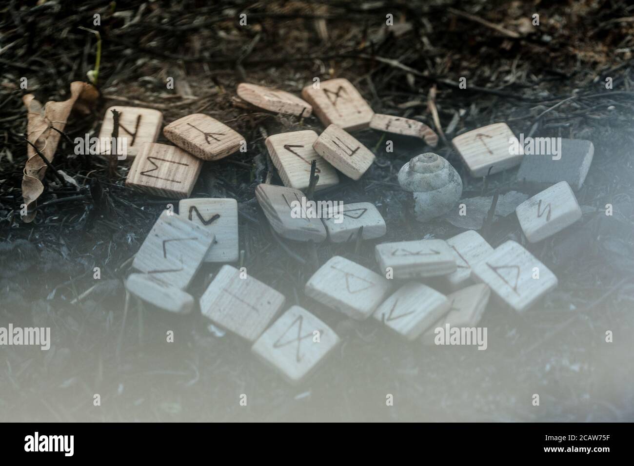 wooden runes on the ground Stock Photo - Alamy