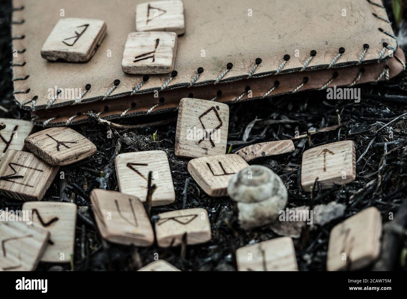 wooden runes on the ground Stock Photo - Alamy