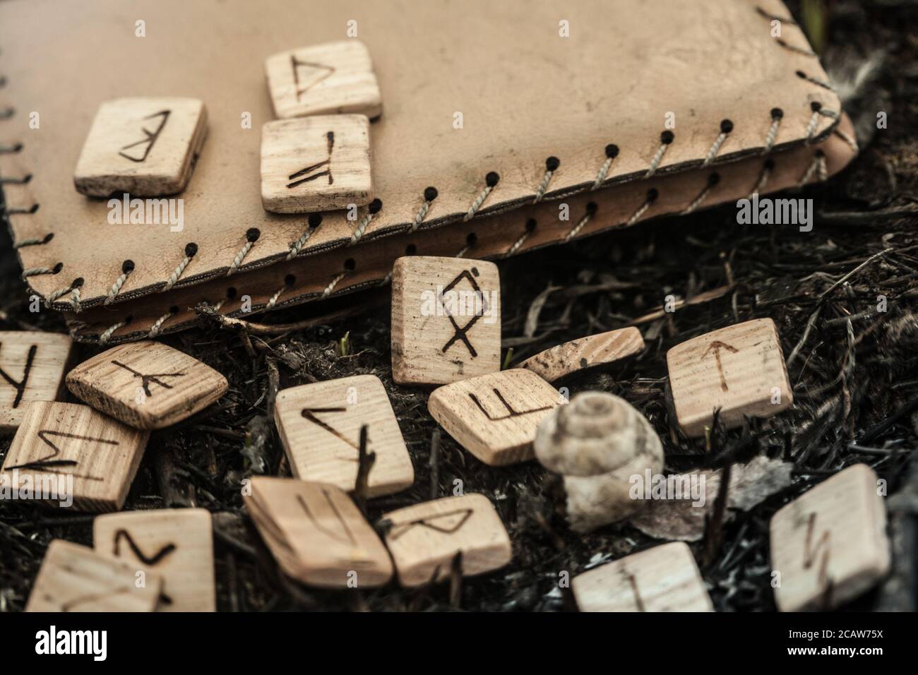 wooden runes on the ground Stock Photo - Alamy
