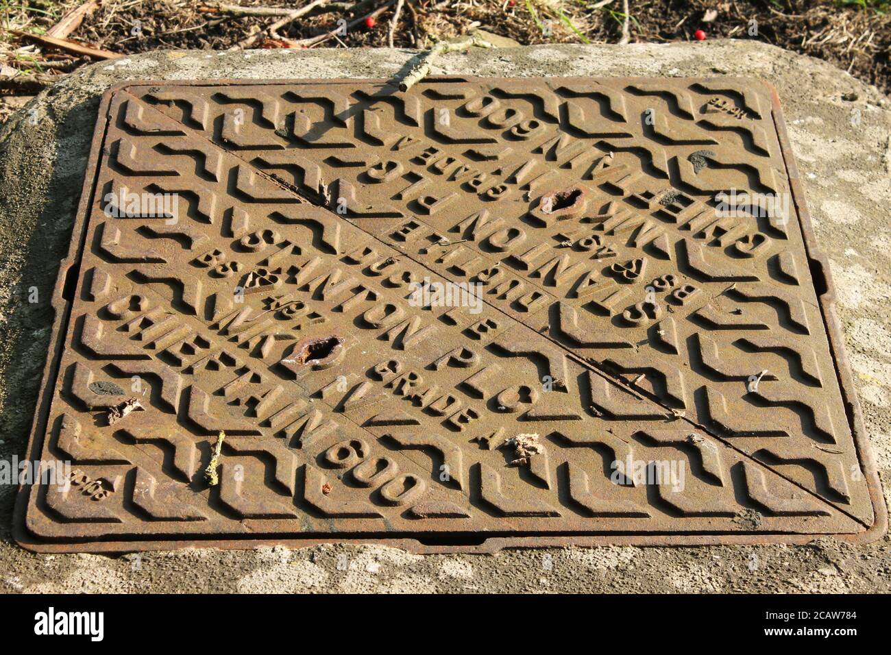 Manhole cover cast iron hi-res stock photography and images - Alamy