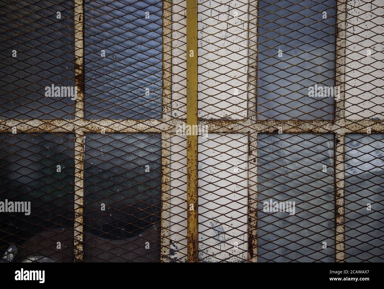 Old wooden door with glass, detail of decoration and abandonment ...