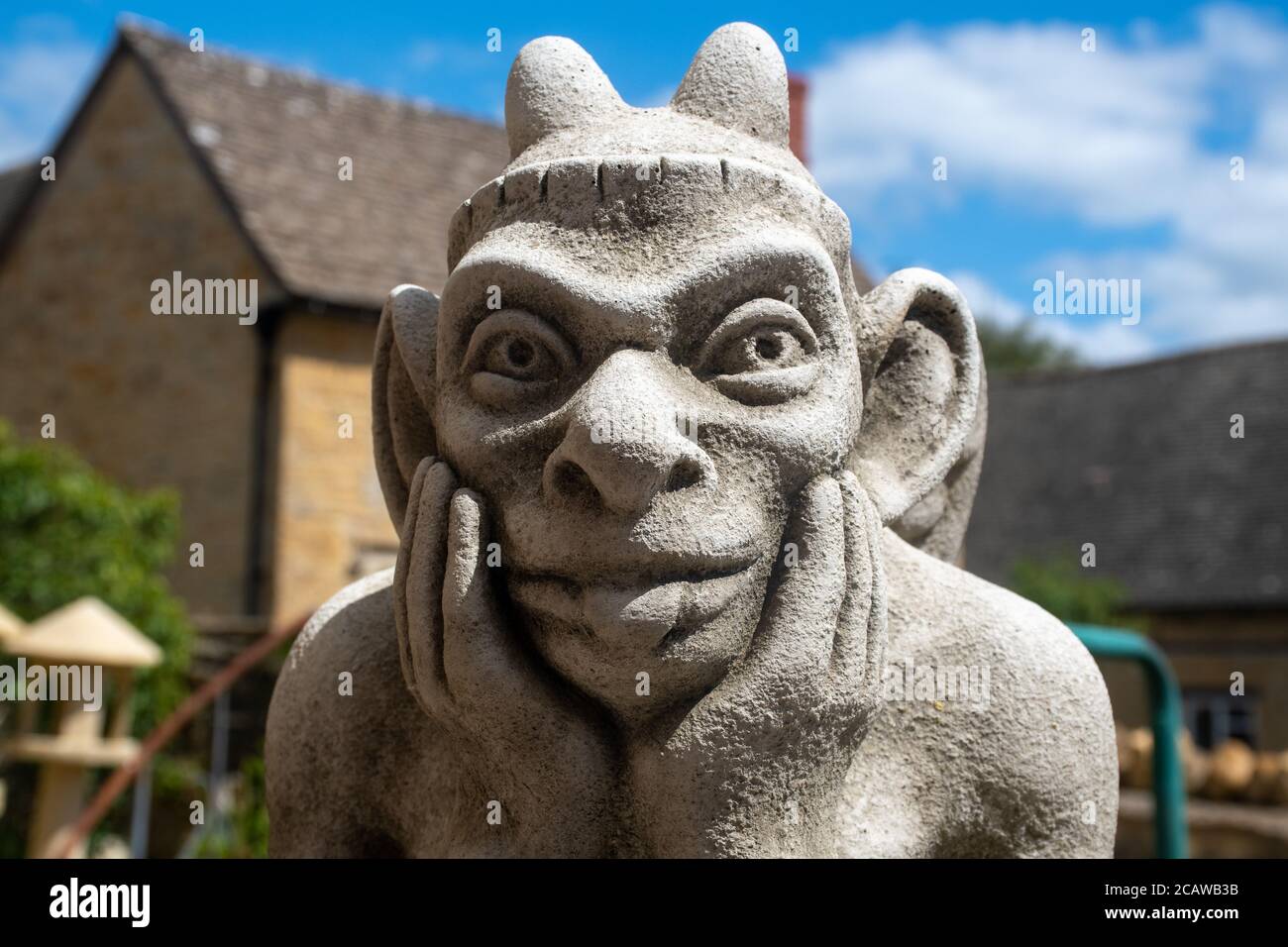 Stone statue of Goblin Face Stock Photo - Alamy