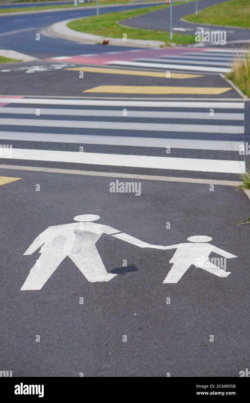 Road surface marking for footpath next to the zebra crossing Stock ...