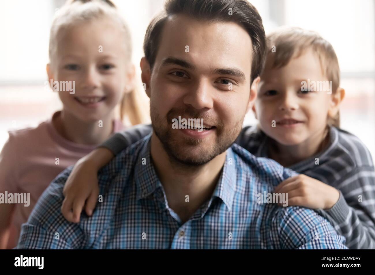 Man holding children hi-res stock photography and images - Alamy