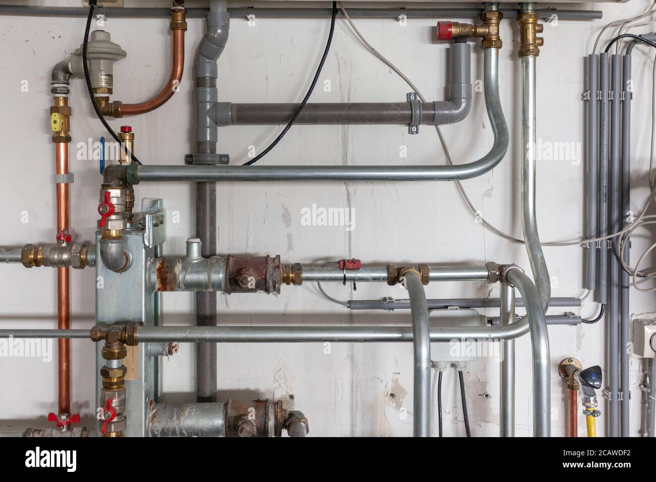 Closeup shot of pipes and valves of a central heating system Stock ...