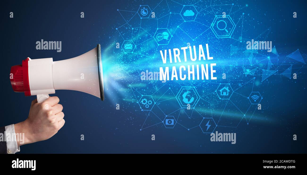 Young woman shouting in megaphone with VIRTUAL MACHINE inscription ...