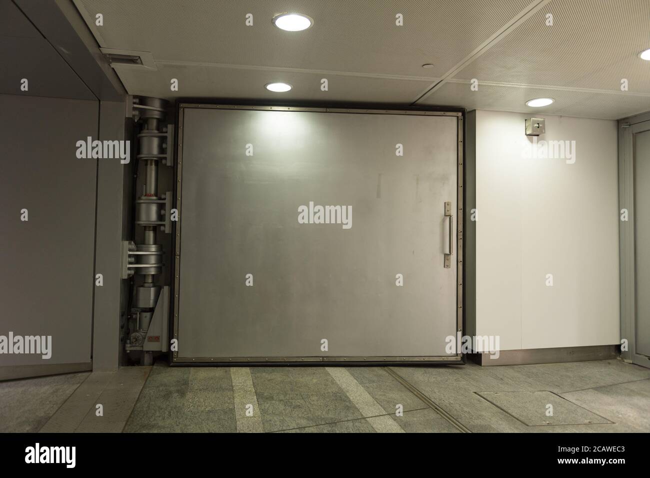 sidewalk by street wall & door Stock Photo - Alamy