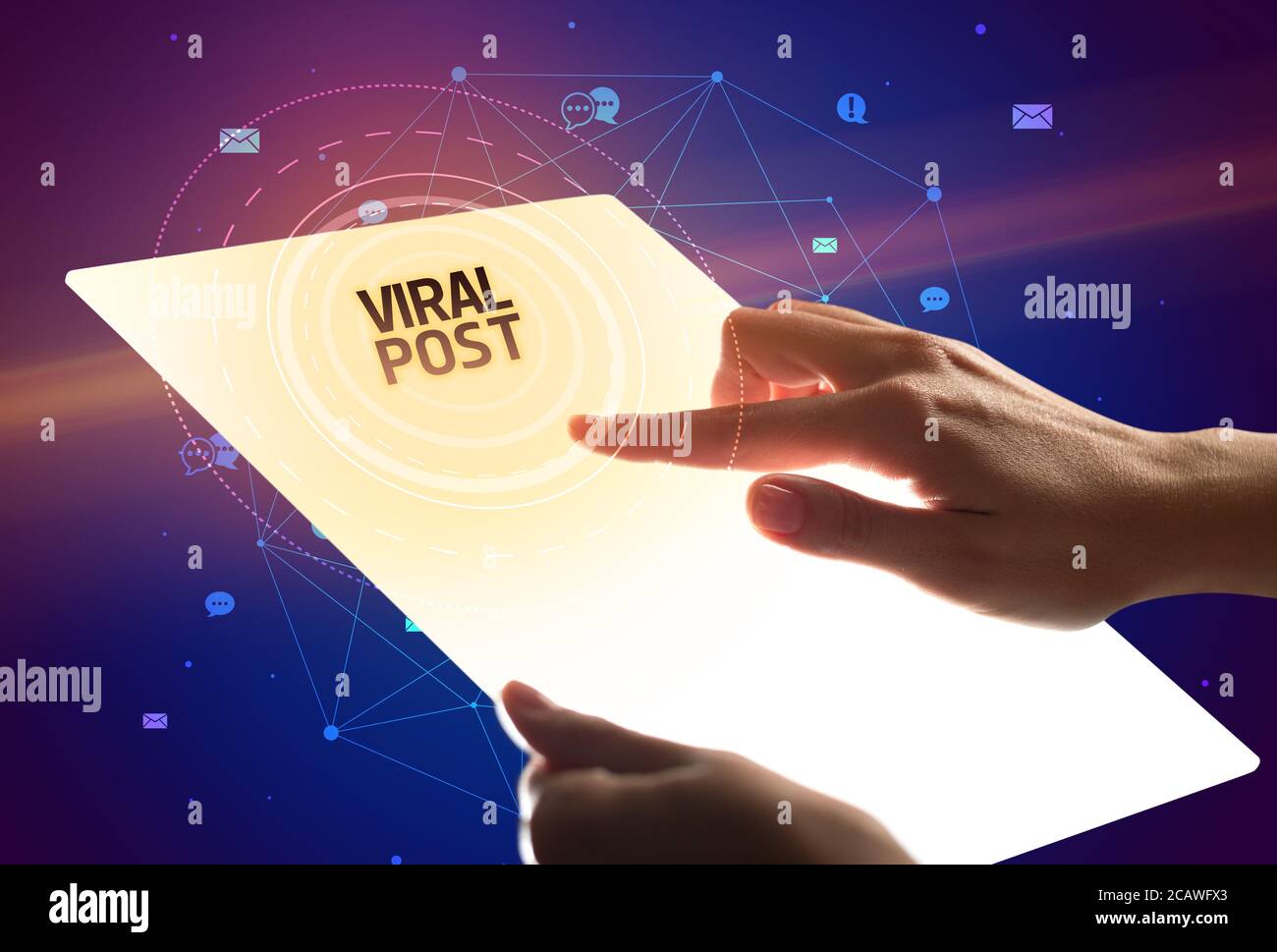 Holding futuristic tablet with VIRAL POST inscription, social media ...