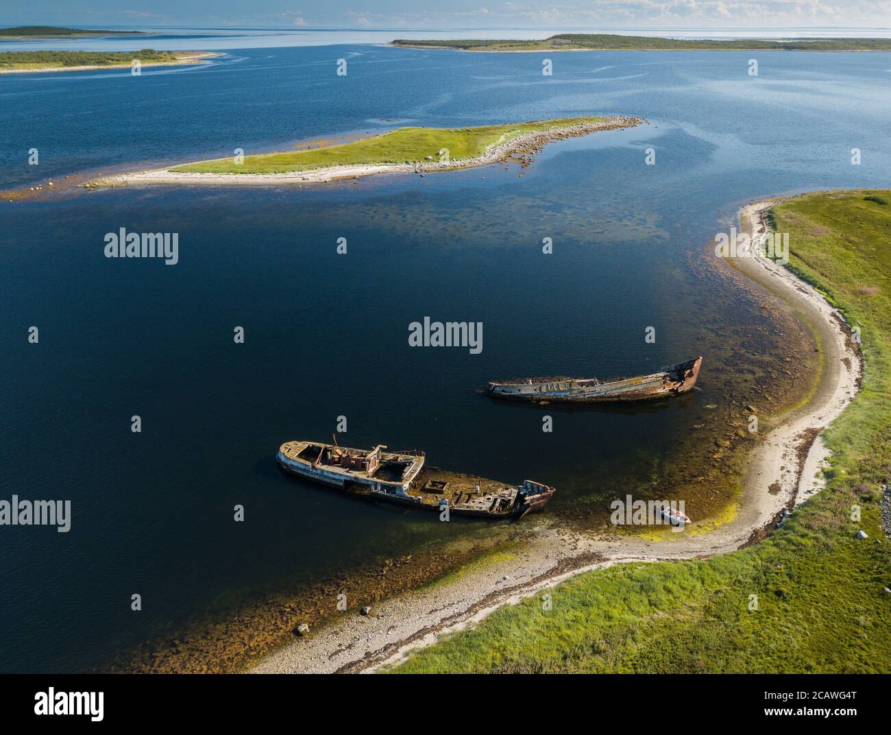 Aerial view of abandoned and derelict rusty old ships near lonaly ...