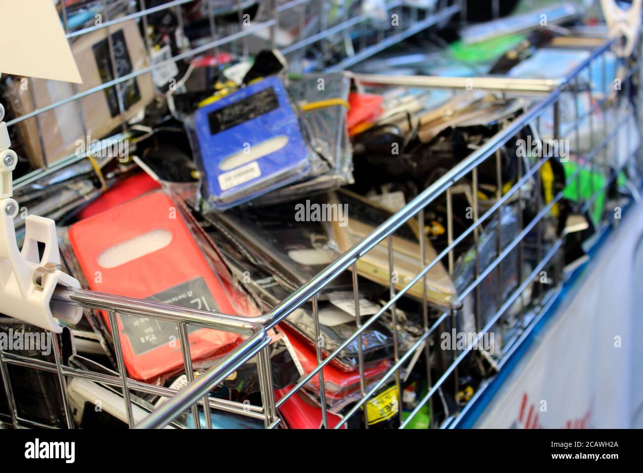 Pile of many different smartphone cases stacked on top of each other in ...