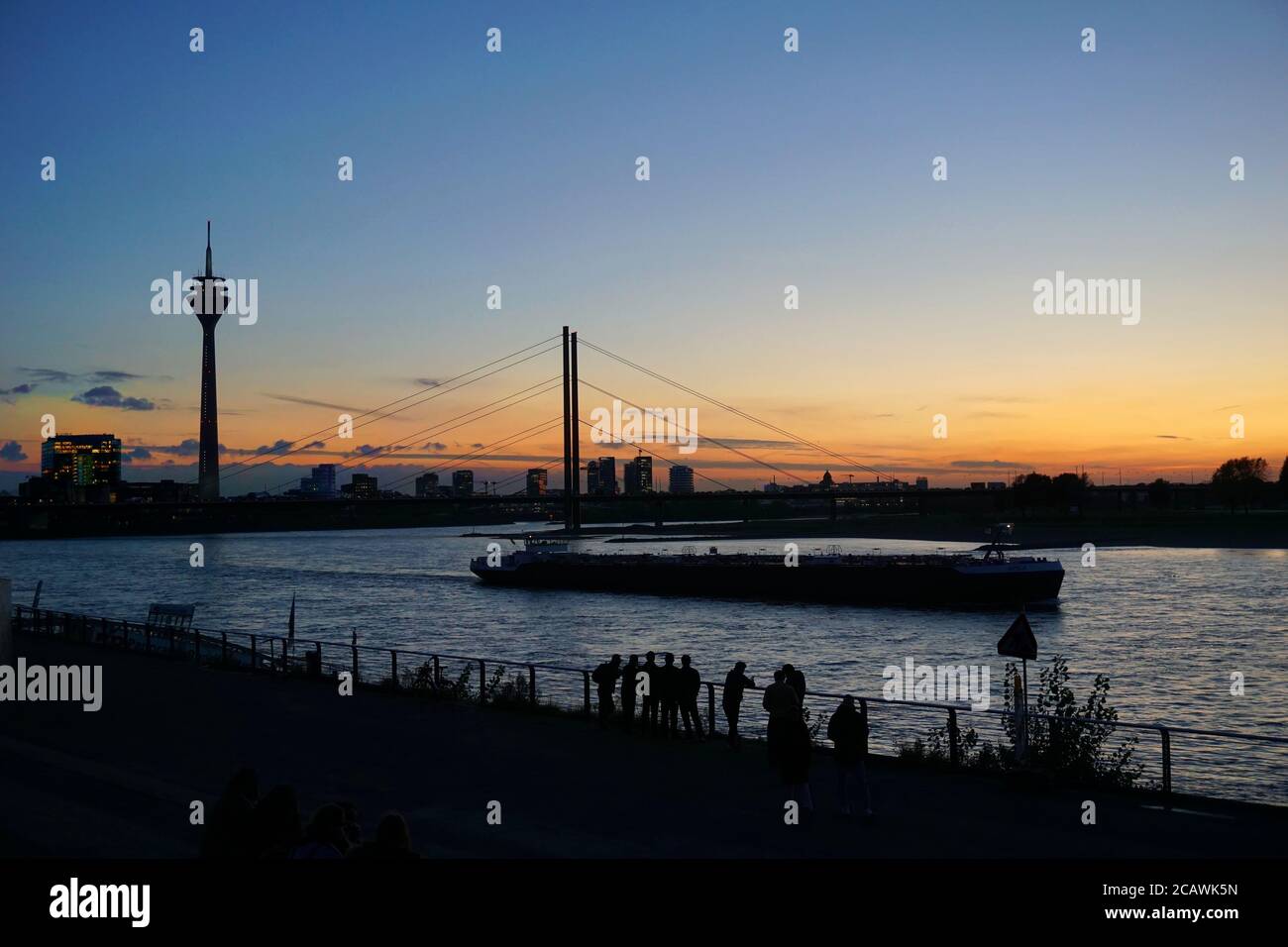 Panoramic view with a romantic sunset at Rhine river in Düsseldorf with ...