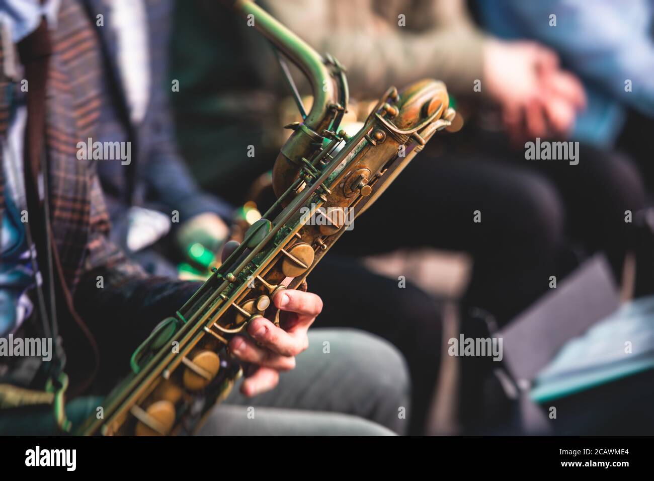 Concert view of a saxophonist, saxophone sax player with vocalist and ...