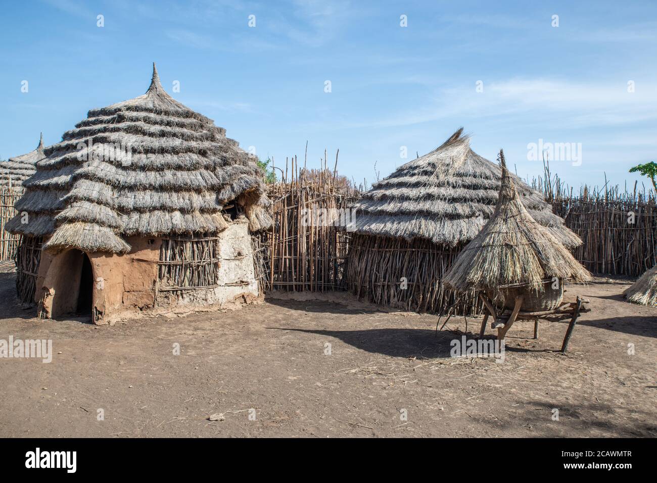 Huts and food stores in a Karamojong village, Moroto District, Uganda ...