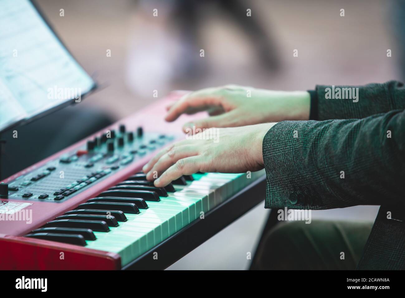 Concert view of a musical keyboard piano player during musical jazz ...