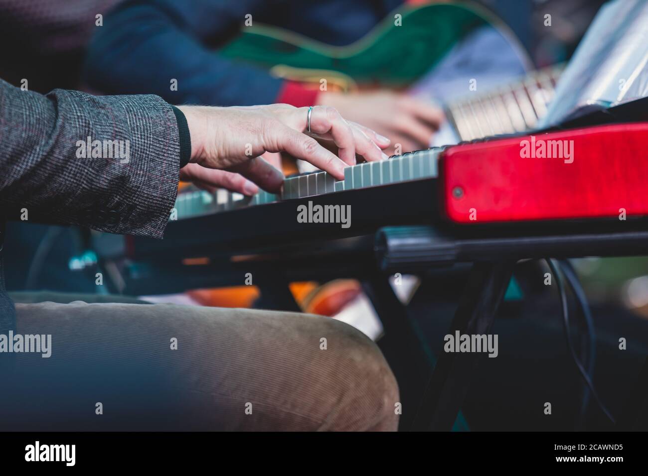 Concert view of a musical keyboard piano player during musical jazz ...