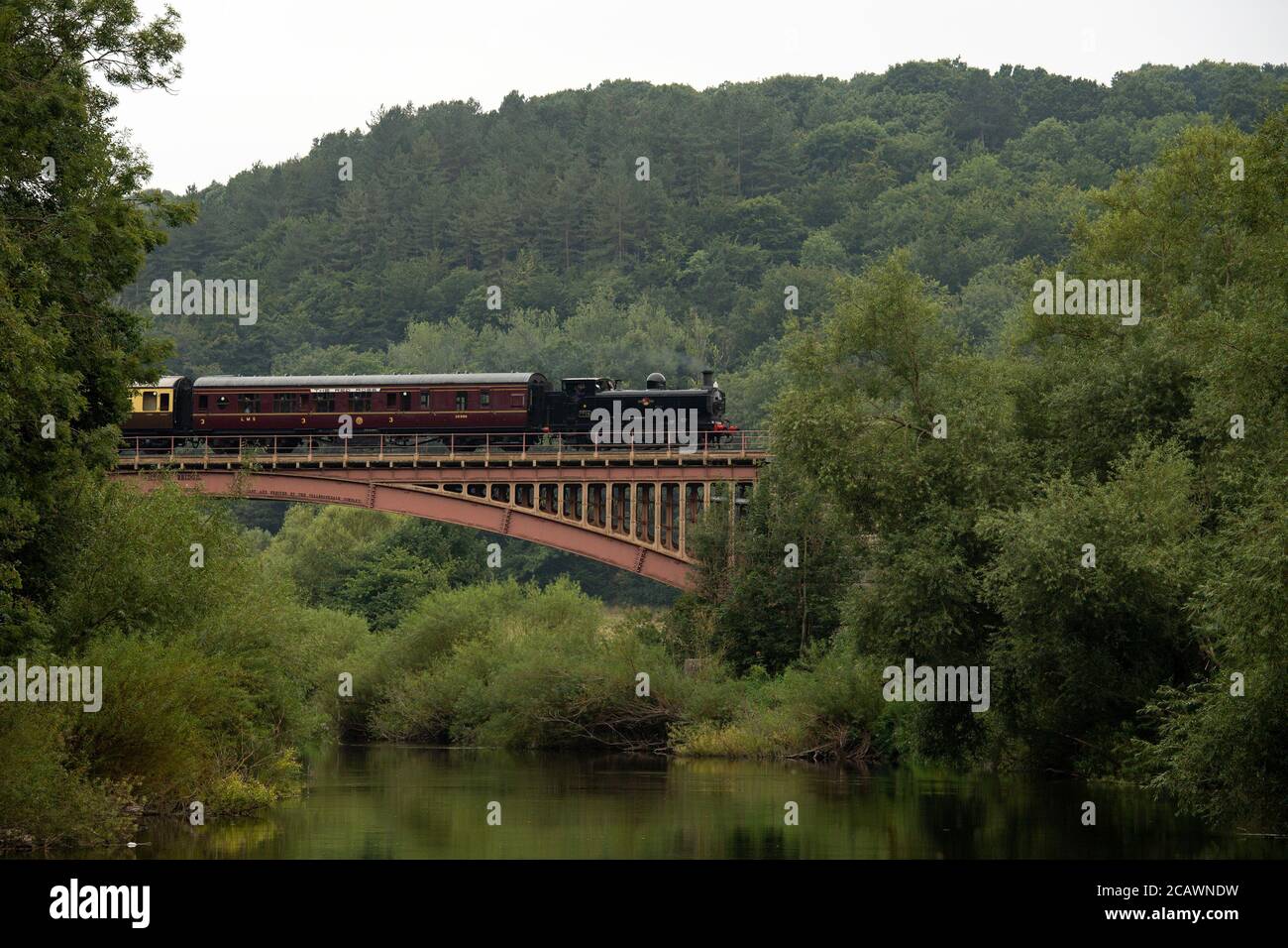A steam locomotive crosses the Victoria Bridge on the Severn Valley ...