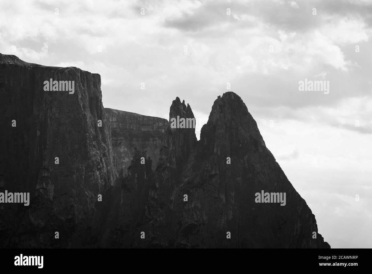 Peaks of Santnerspitze and Euringerspitze of Schlern mountain in black ...