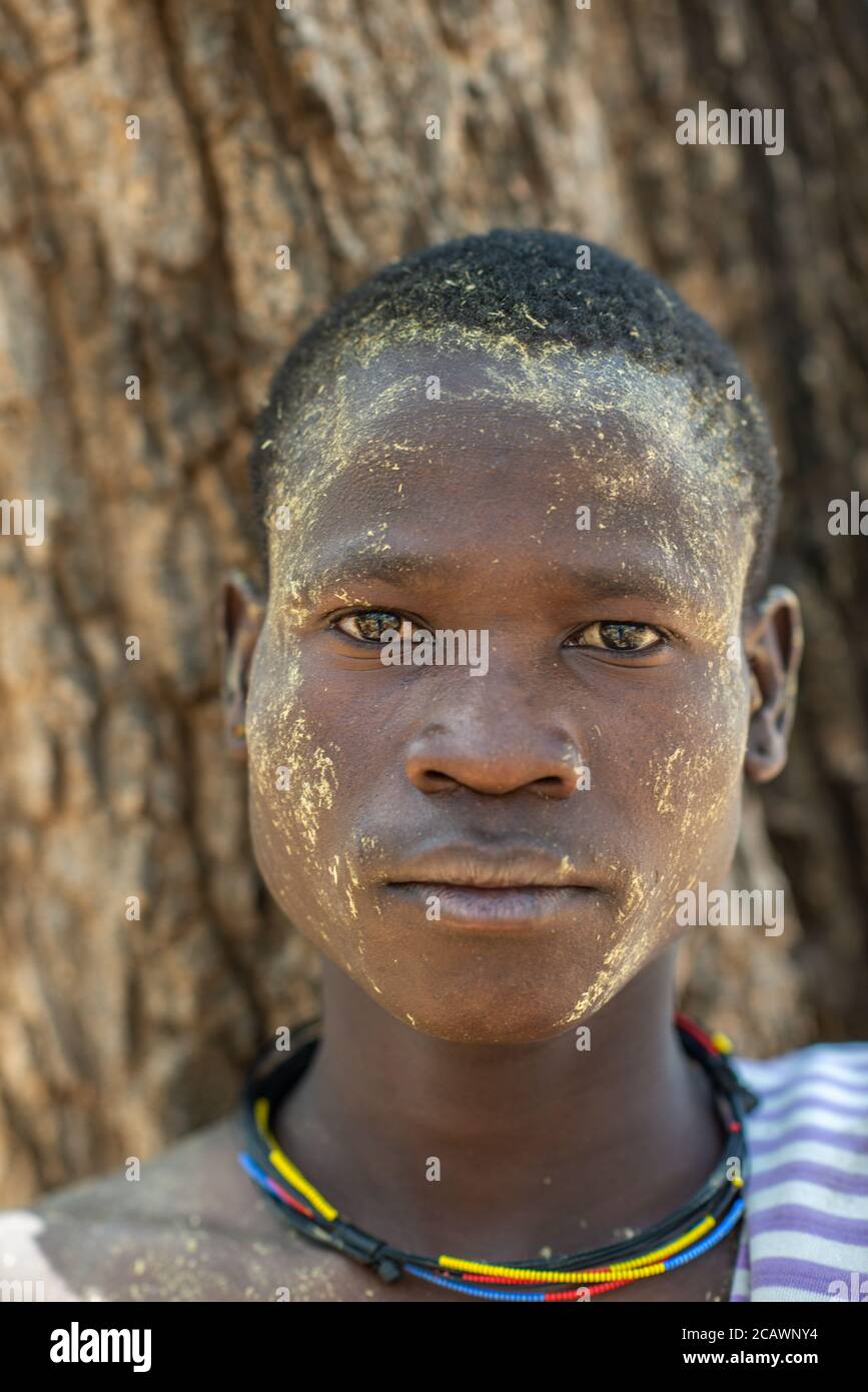Young man blessed with cow cud during an agricultural rite among ...
