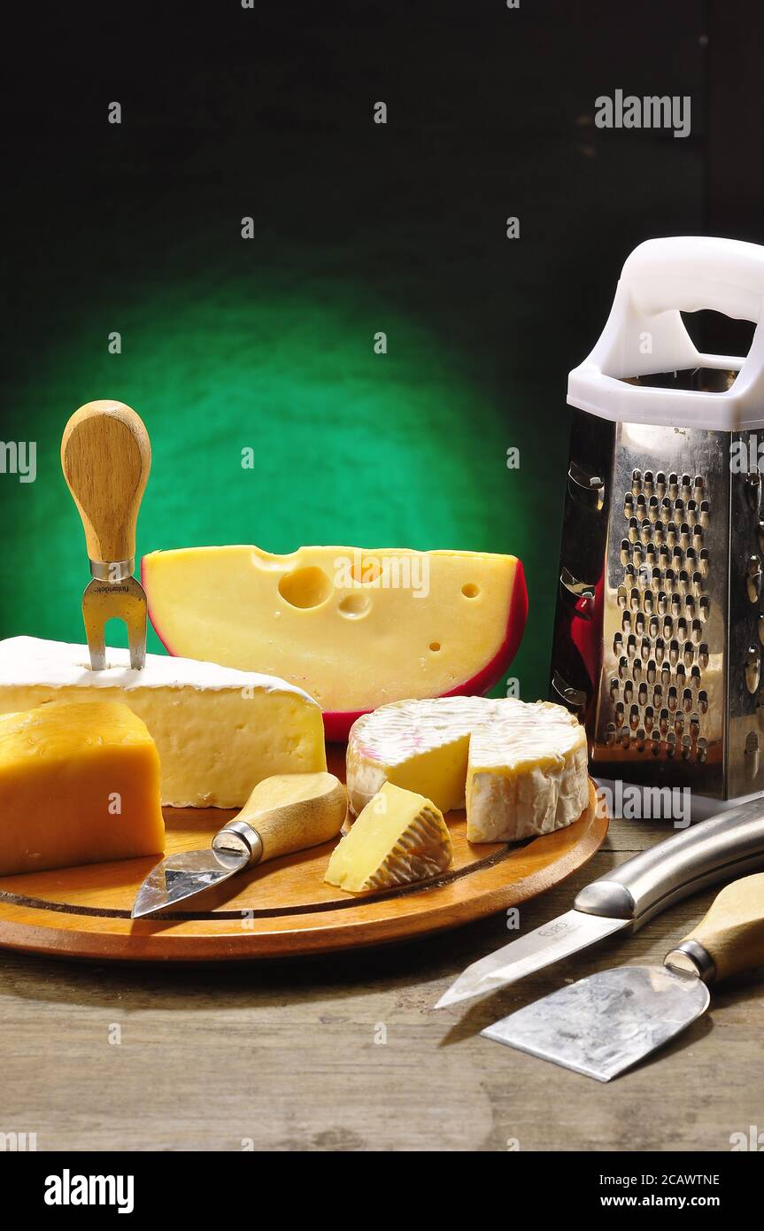 Table of mixed cheese on a studio shot Stock Photo - Alamy