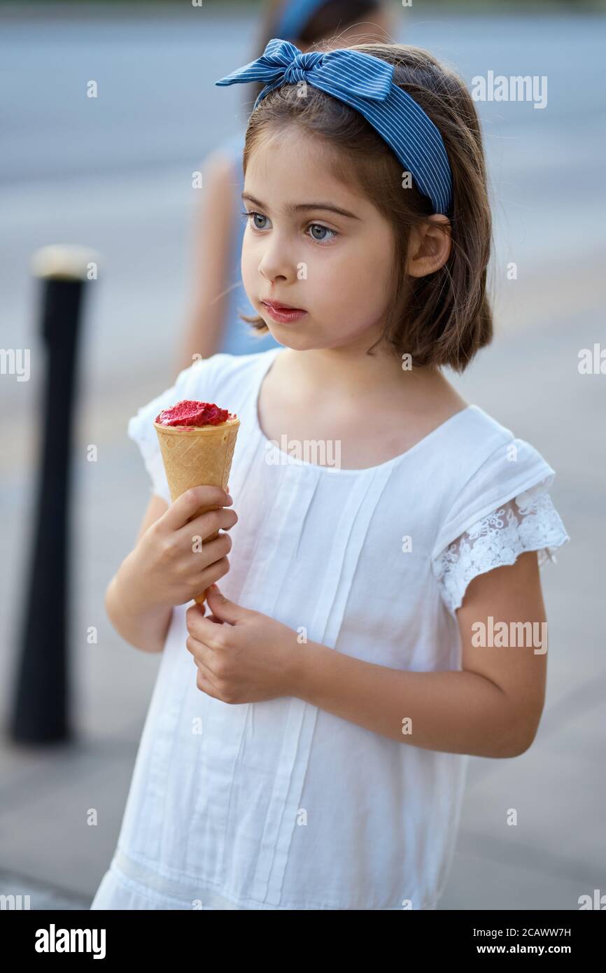 Schoolgirl with ice cream hi-res stock photography and images - Alamy