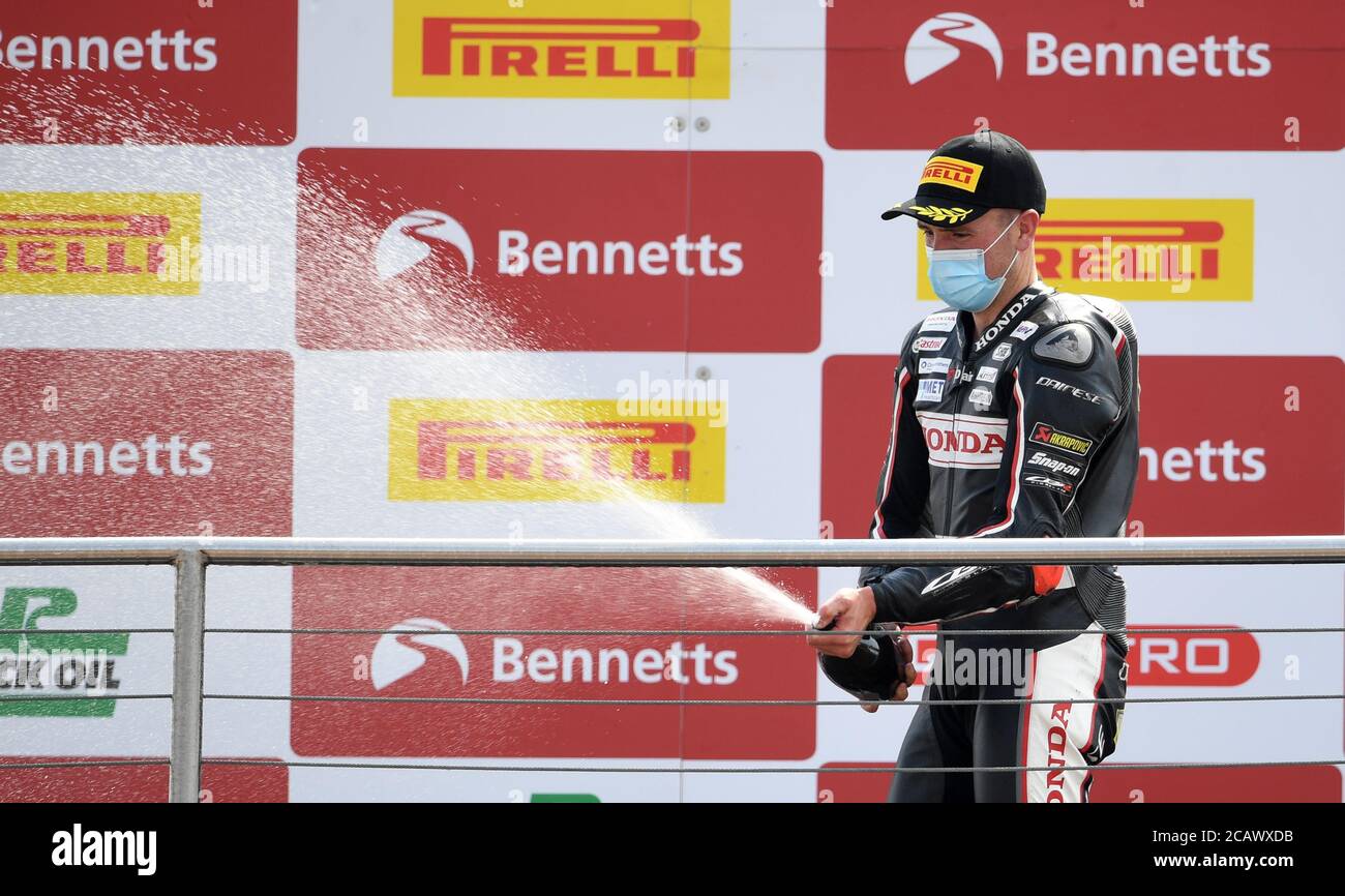 Honda Racing's Andrew Irwin celebrates winning race two at Donington ...