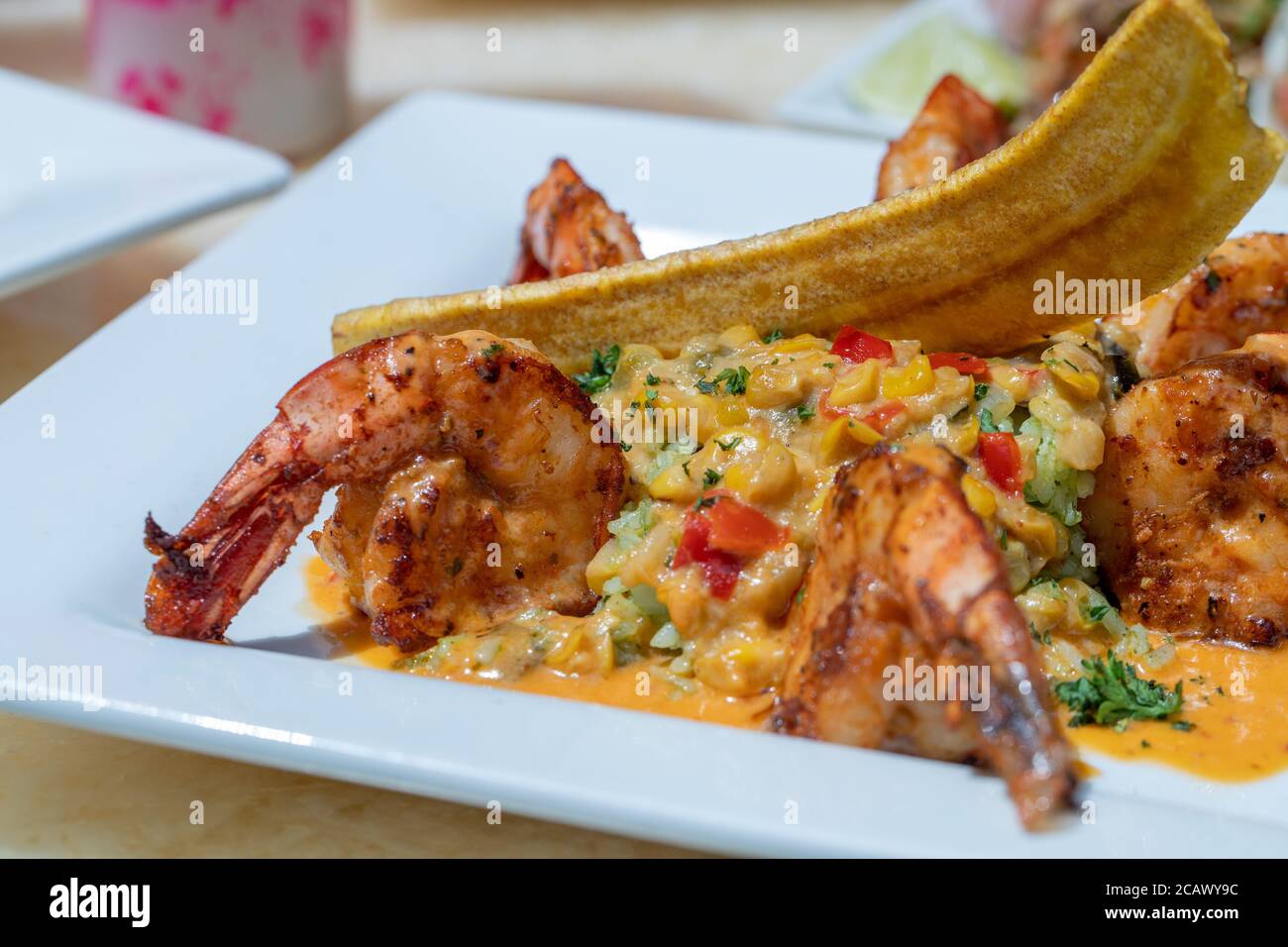Closeup of shrimp salad with rice, corn in a plate Stock Photo - Alamy