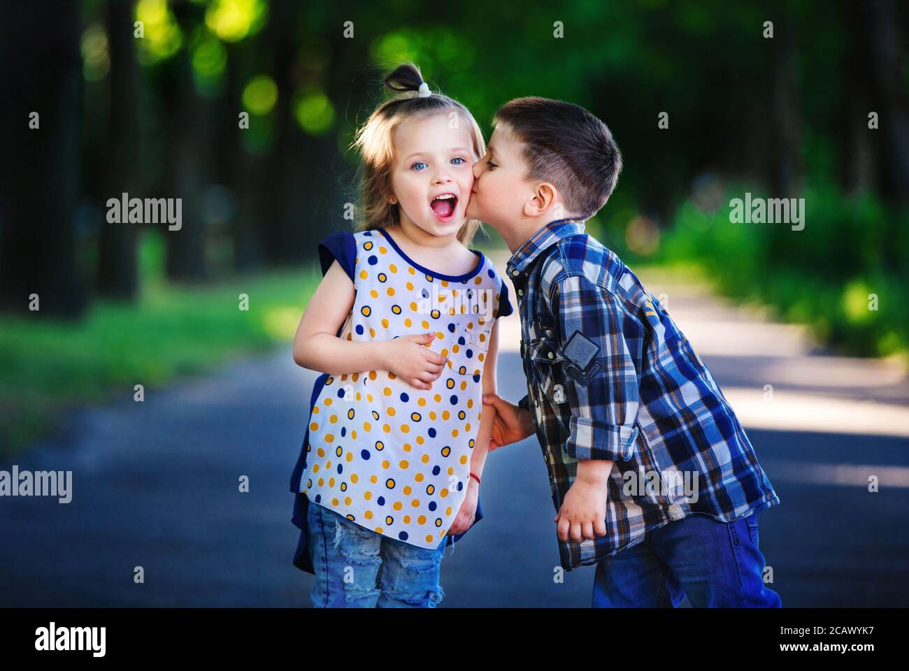 Little Girl And Boy Smiling
