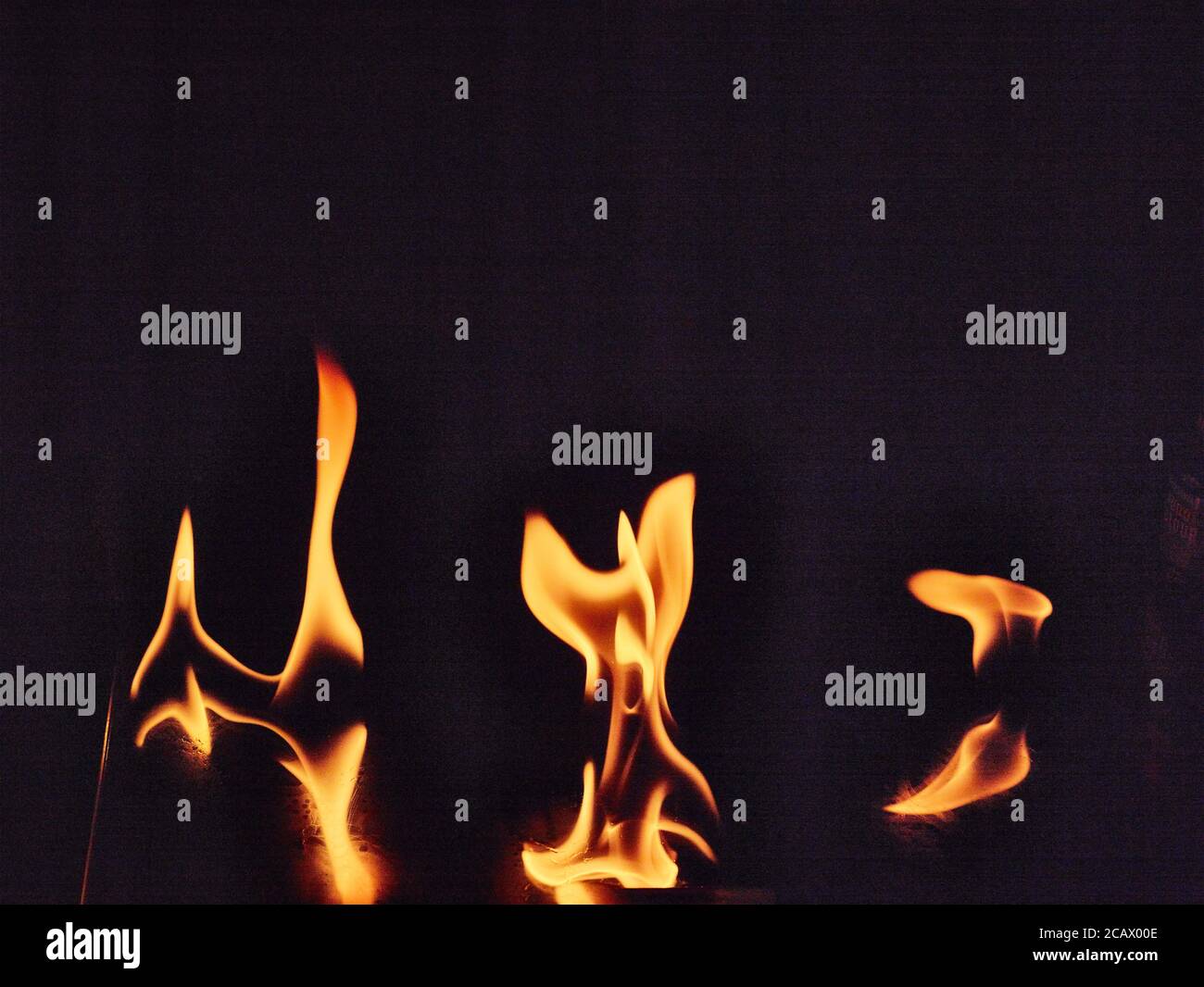 Fire, flames against a black background with reflection Stock Photo - Alamy