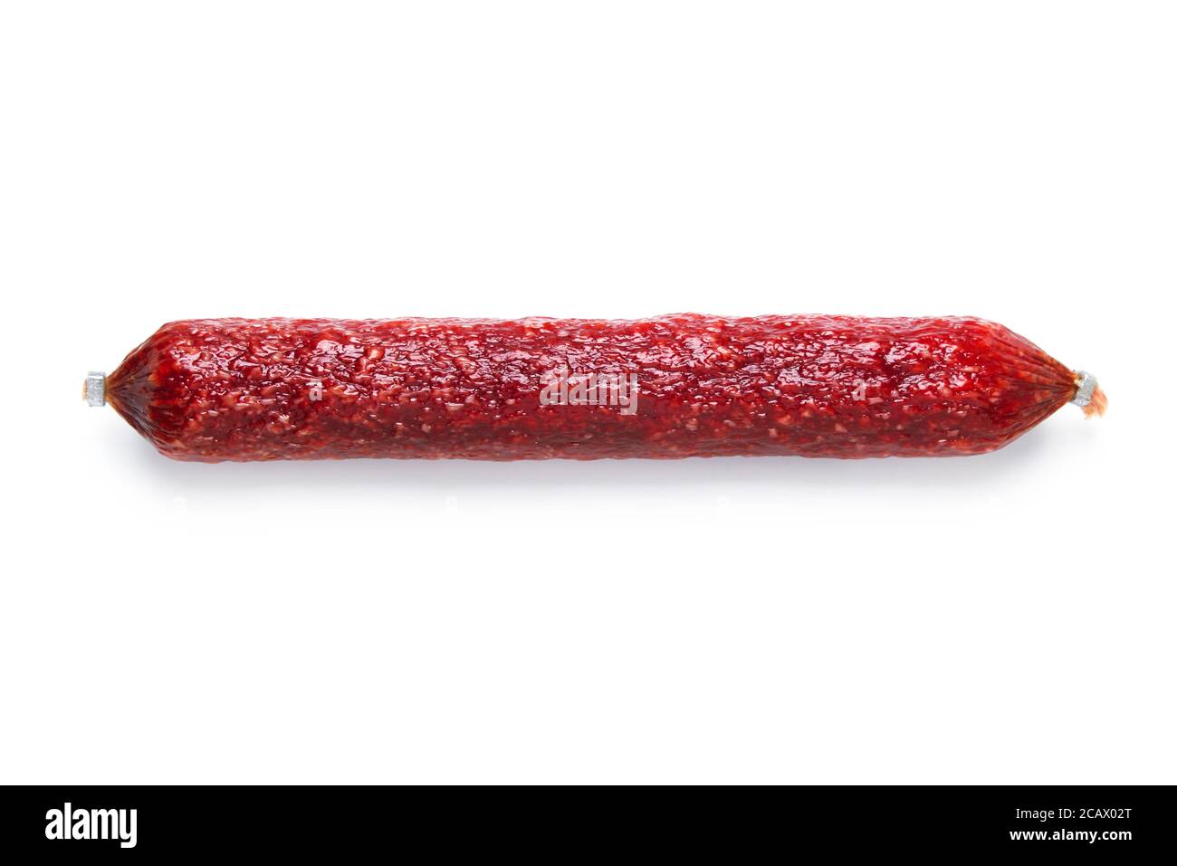 Stick salami close-up isolated on white background Stock Photo - Alamy