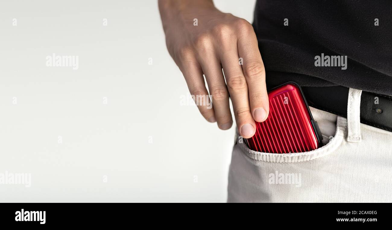 Man holding wallet for credit cards with RFID and NFC protection for ...